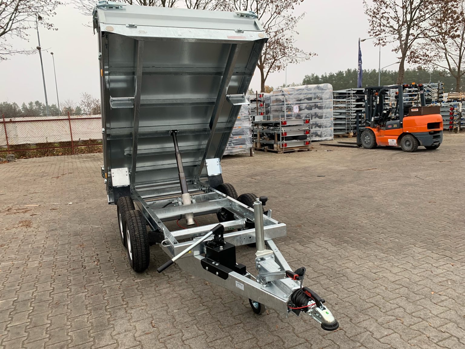 Przyczepa Glowacz Kiper - elektryczny trójstronny aluminiowe burty